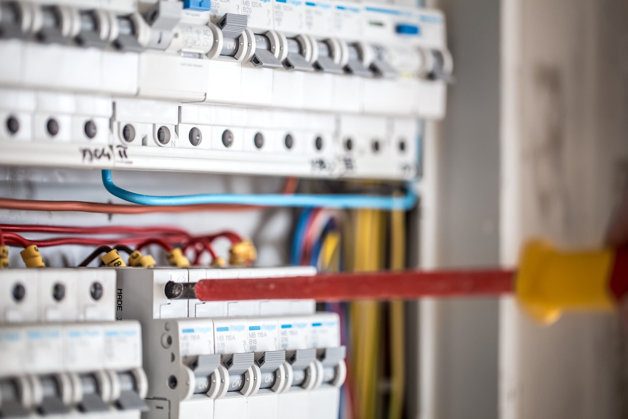 man-electrical-technician-working-switchboard-with-fuses-installation ...